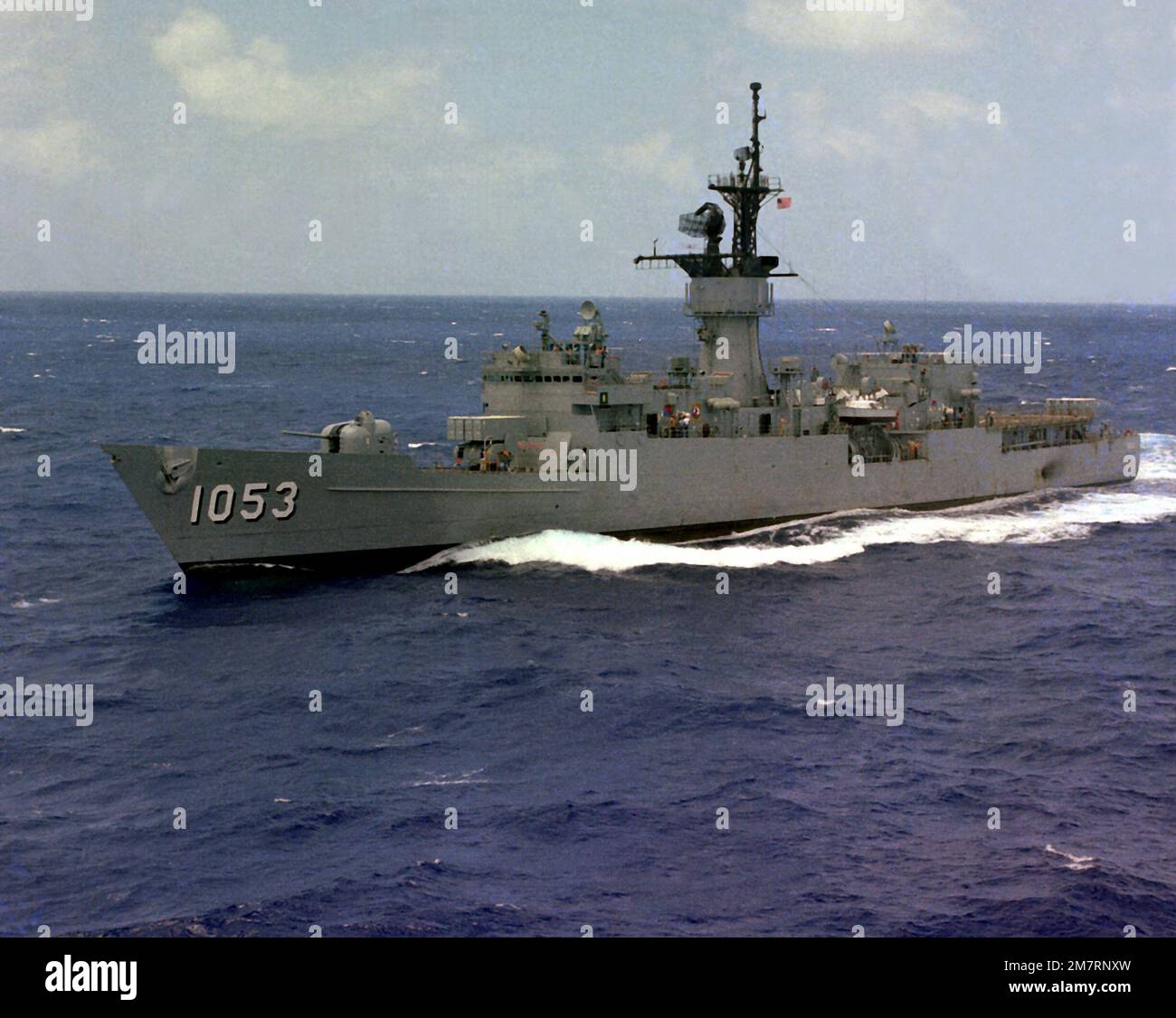 A port bow view of the frigate USS ROARK (FF-1053) underway en route to ...