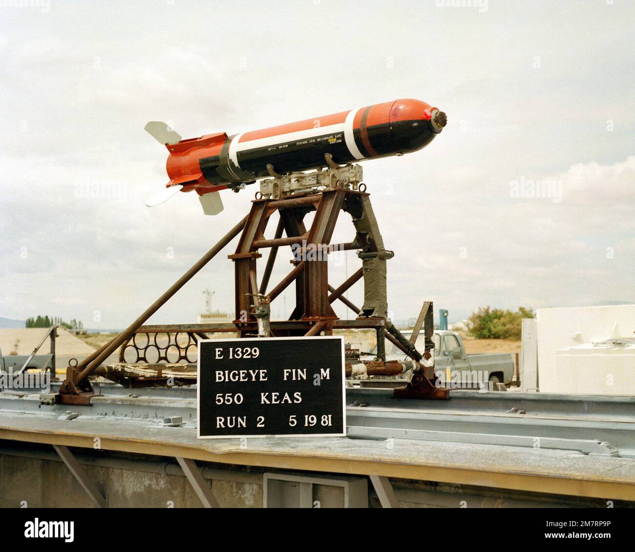 Right side view of an E-1329 Bigeye missile, attached to a sled ...