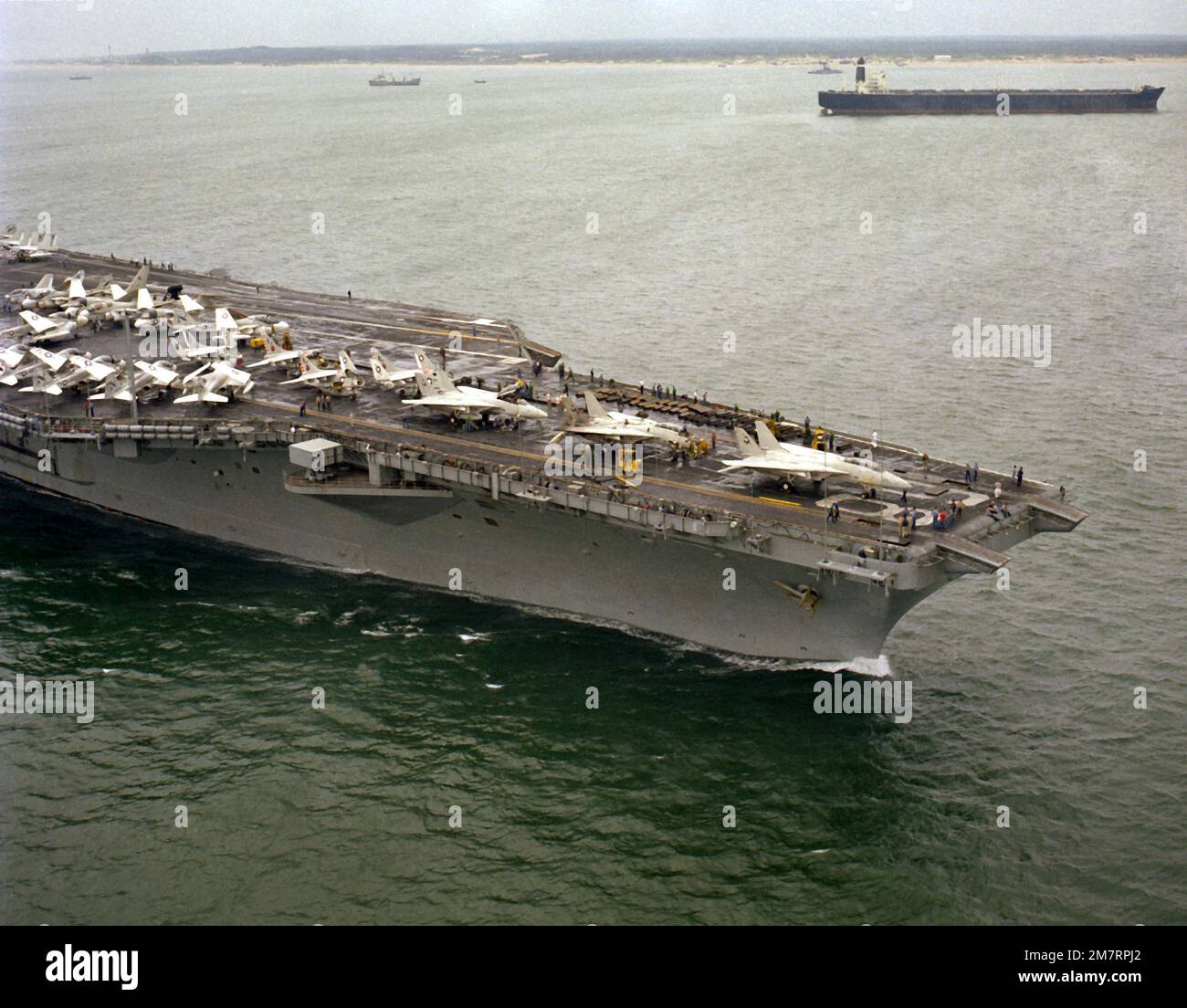 Low angle starboard bow view of the nuclear-powered aircraft carrier ...
