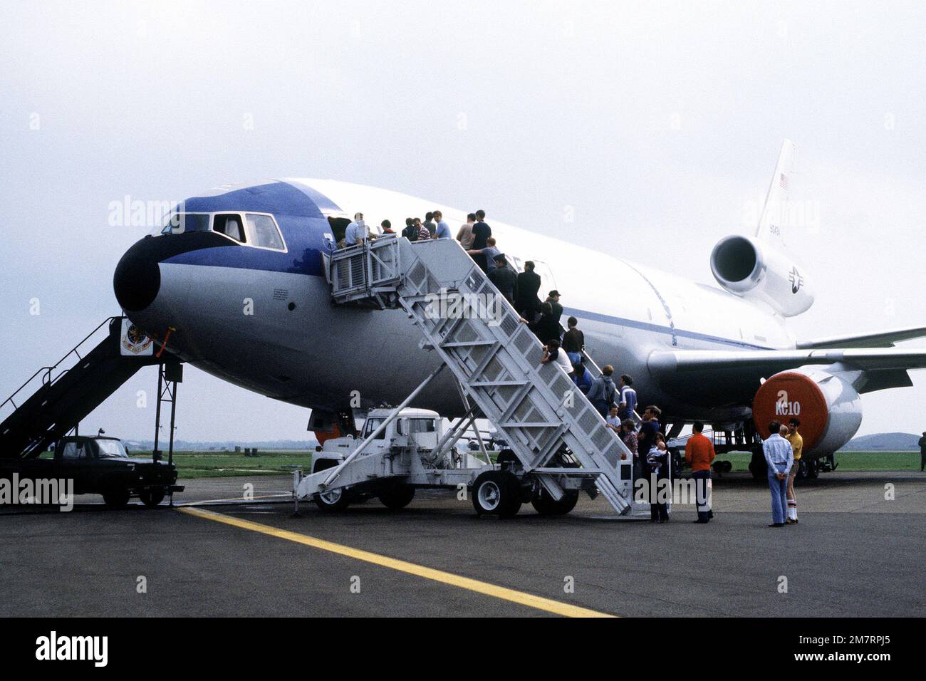 Visitors go aboard for a tour of a KC-10 Extender aircraft during a ...