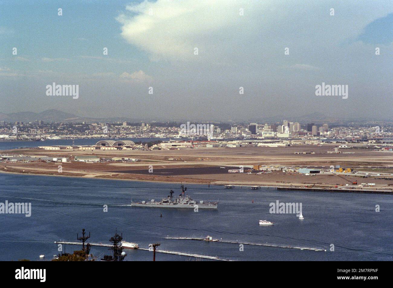 A starboard side view of the destroyer USS TURNER JOY (DD 951) with the ...