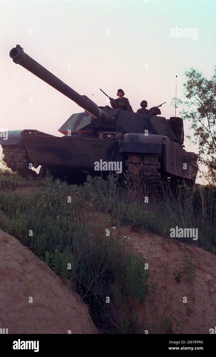 An M-1 main battle tank crew prepares for a confrontation during a ...