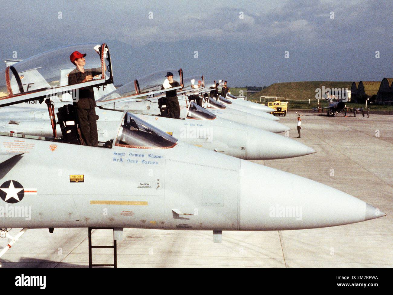 Right side view of F-15 Eagle aircraft on the flight line, as ground ...