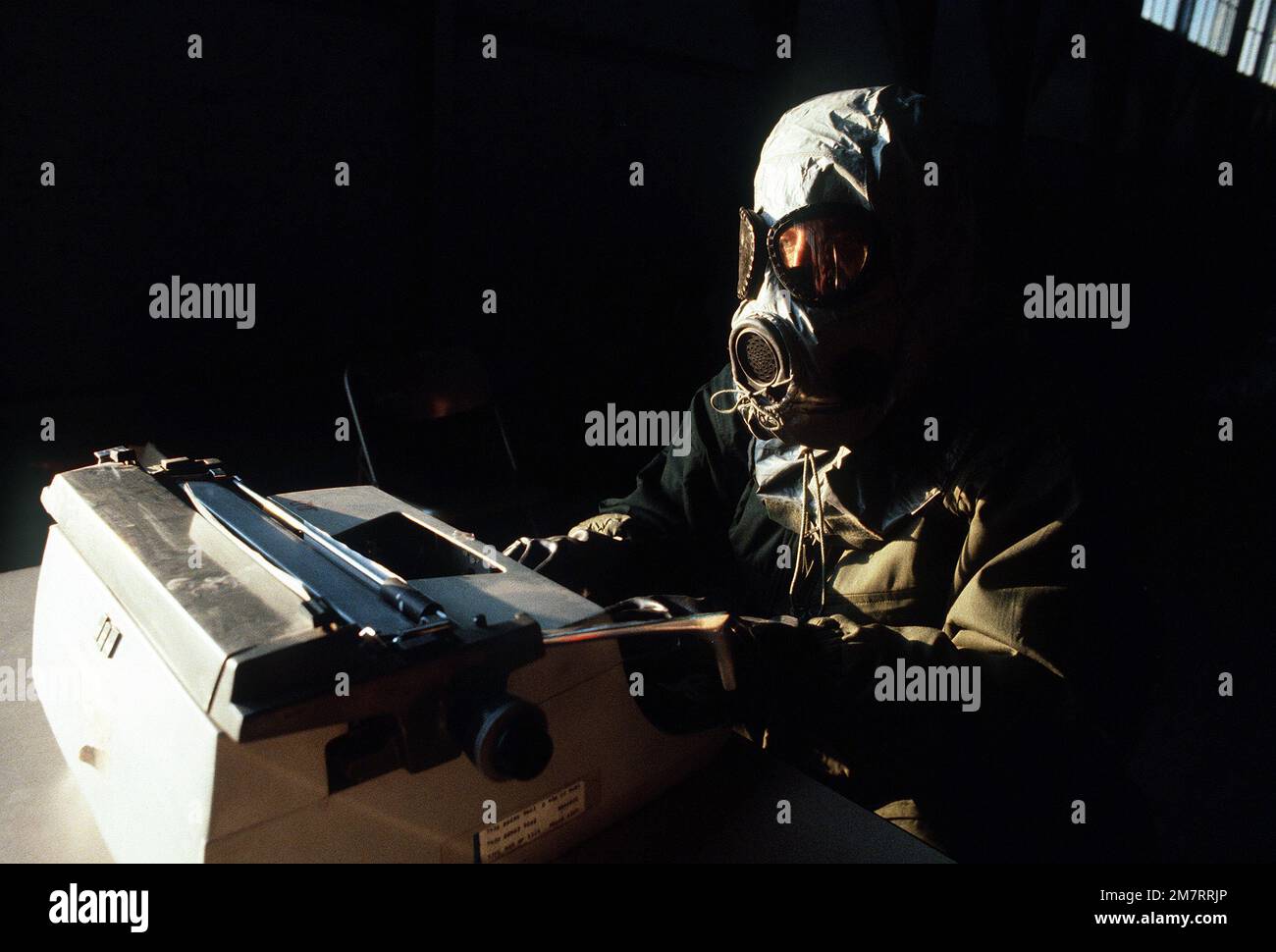A participant in exercise Busy Prairie II, wearing a chemical warfare ...