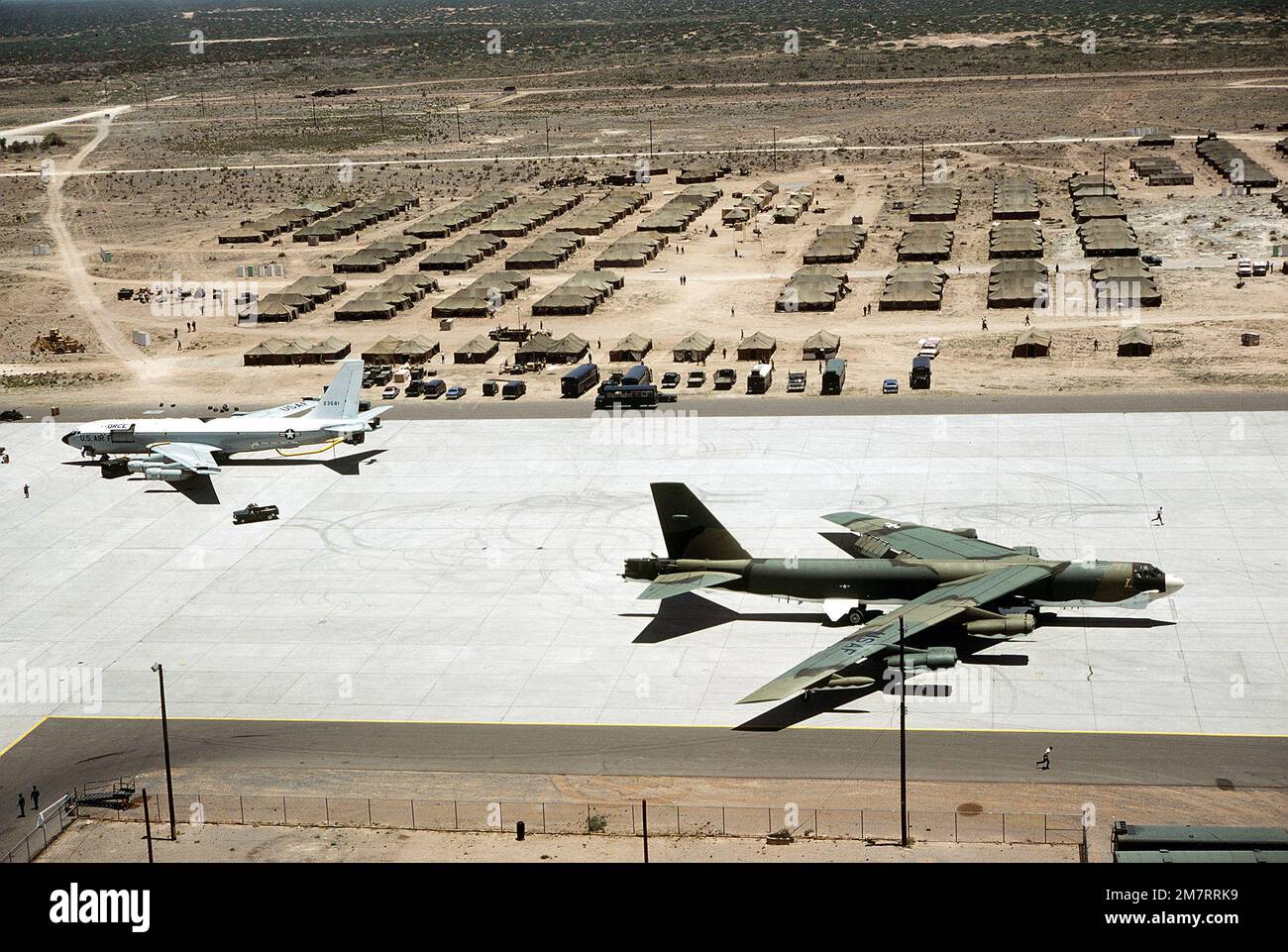 An aerial view of an EC-135 airborne command and control aircraft, left ...