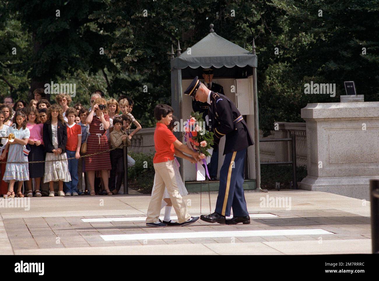 Two children present a wreath at the Tomb of the Unknown Soldier in ...