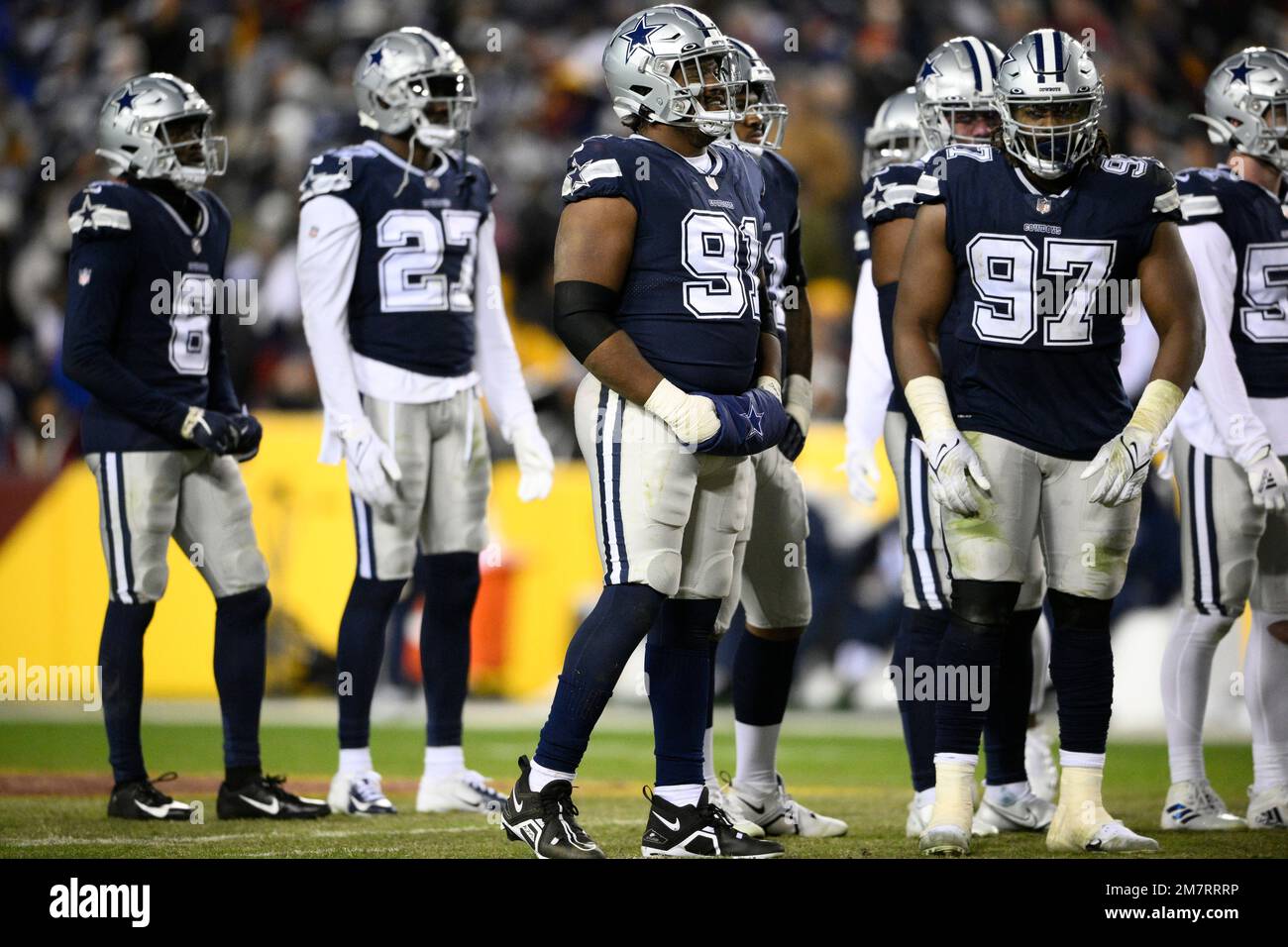 The Dallas Cowboys stand on the field during the second half of an NFL ...