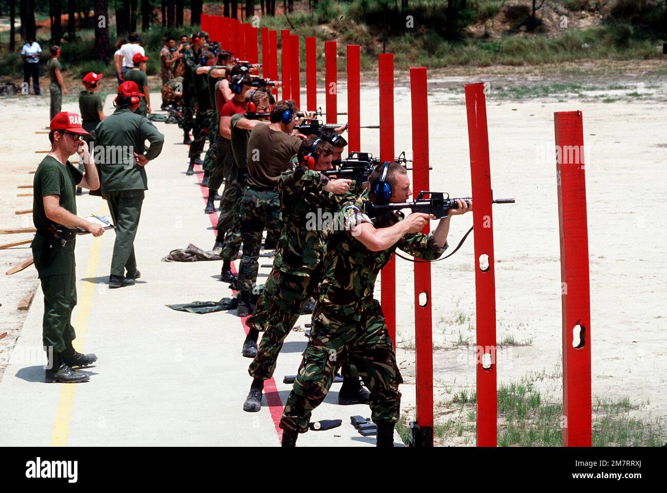 Royal Canadian Air Force members fire M-177 machine guns at the range ...