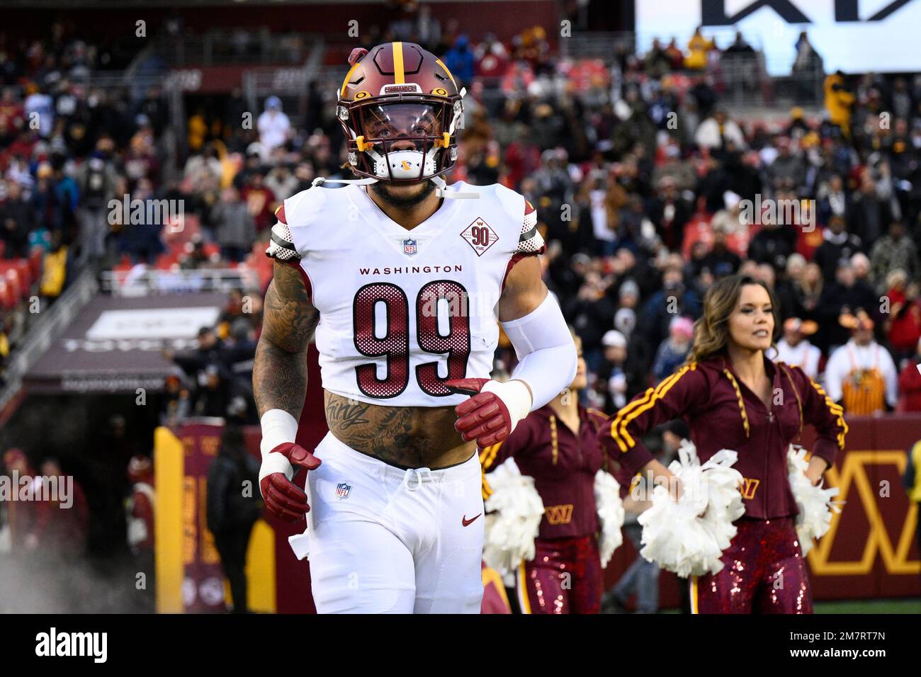Washington Commanders defensive end Chase Young (99) takes to the field ...