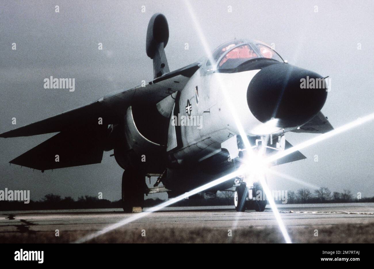 A right front view of a parked EF-111A tactical jamming system aircraft ...
