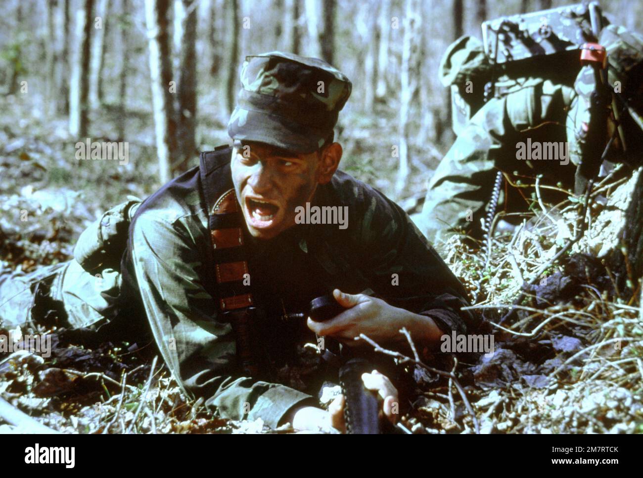 Radioman PFC J. Krippendorf and his squad leader, CPL C. Candelario ...