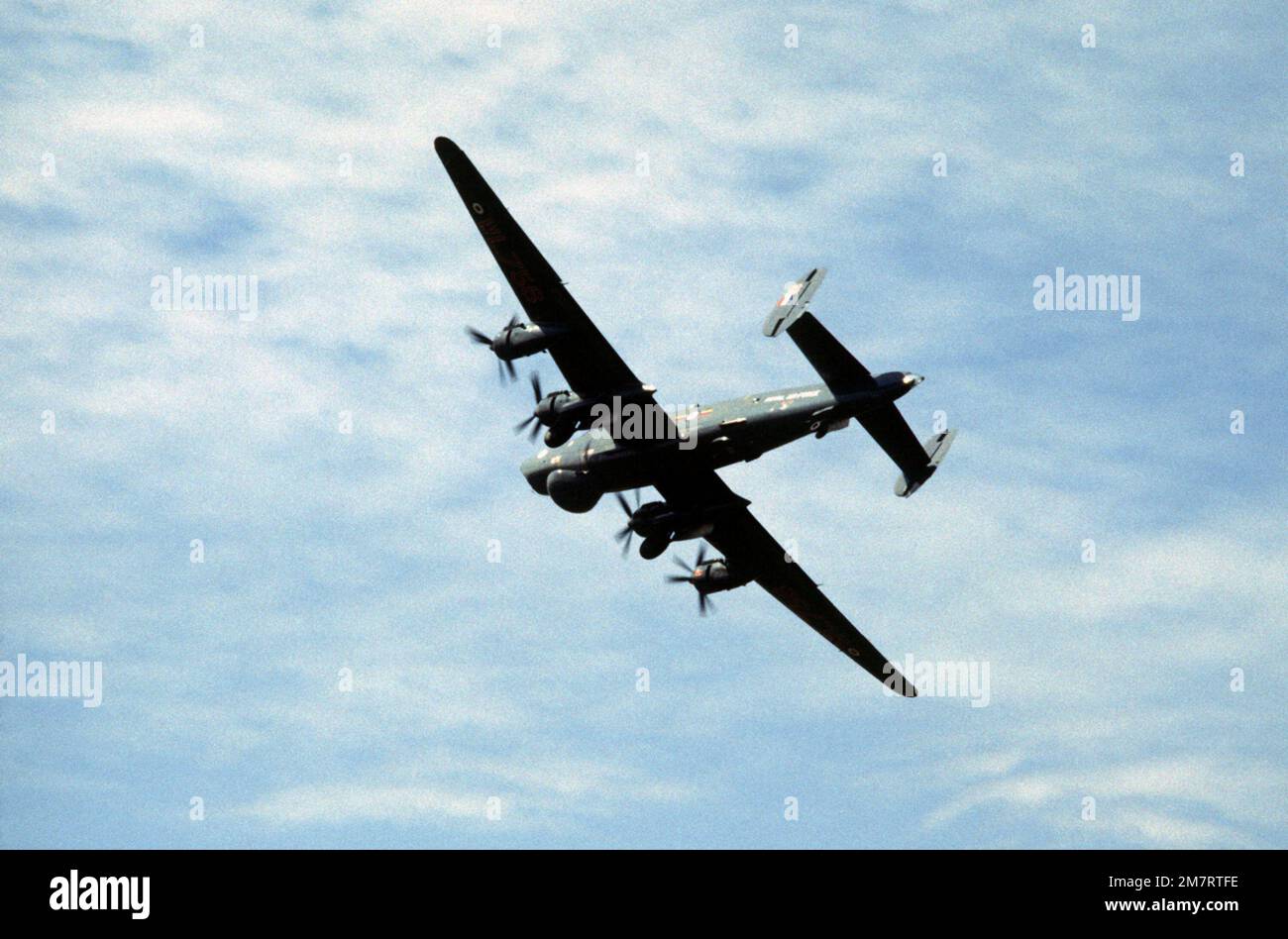 Bottom view of a Royal Air Force Shackleton aircraft in flight. The ...