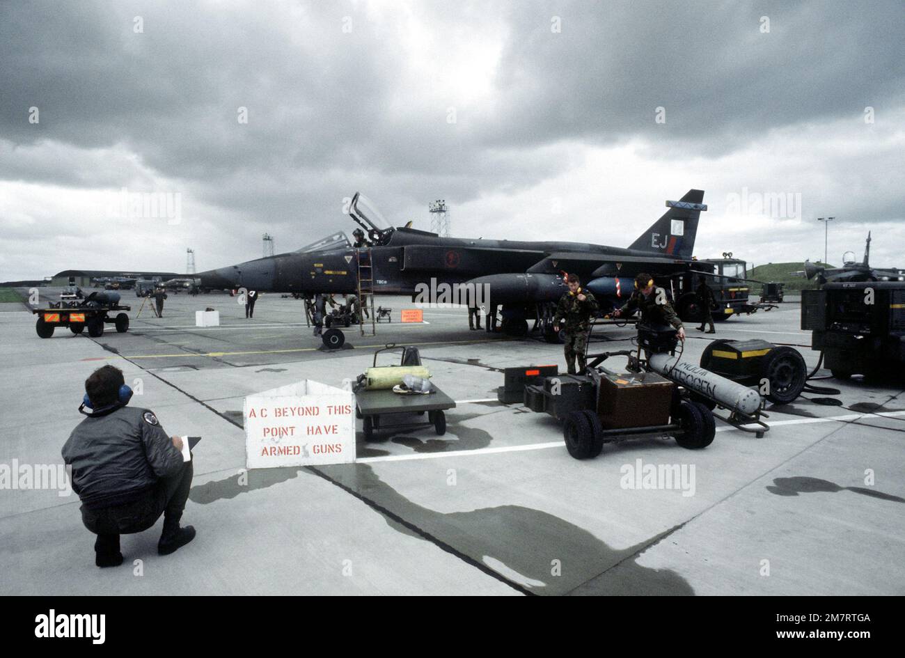 A judge observes maintenance performance of a Royal Air Force team on a ...