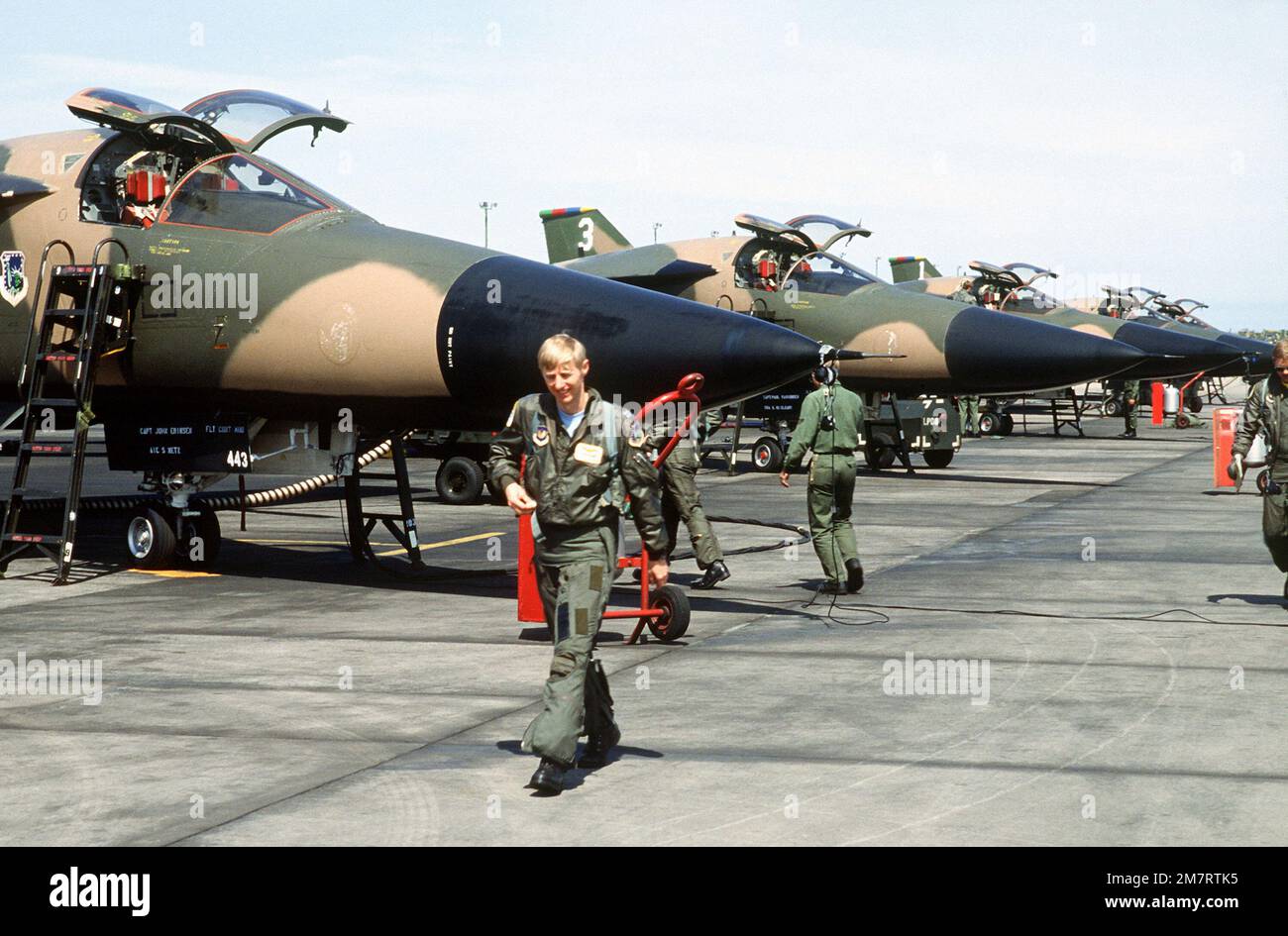 Pilots, from the 48th Tactical Fighter Wing, approach to get on board F ...