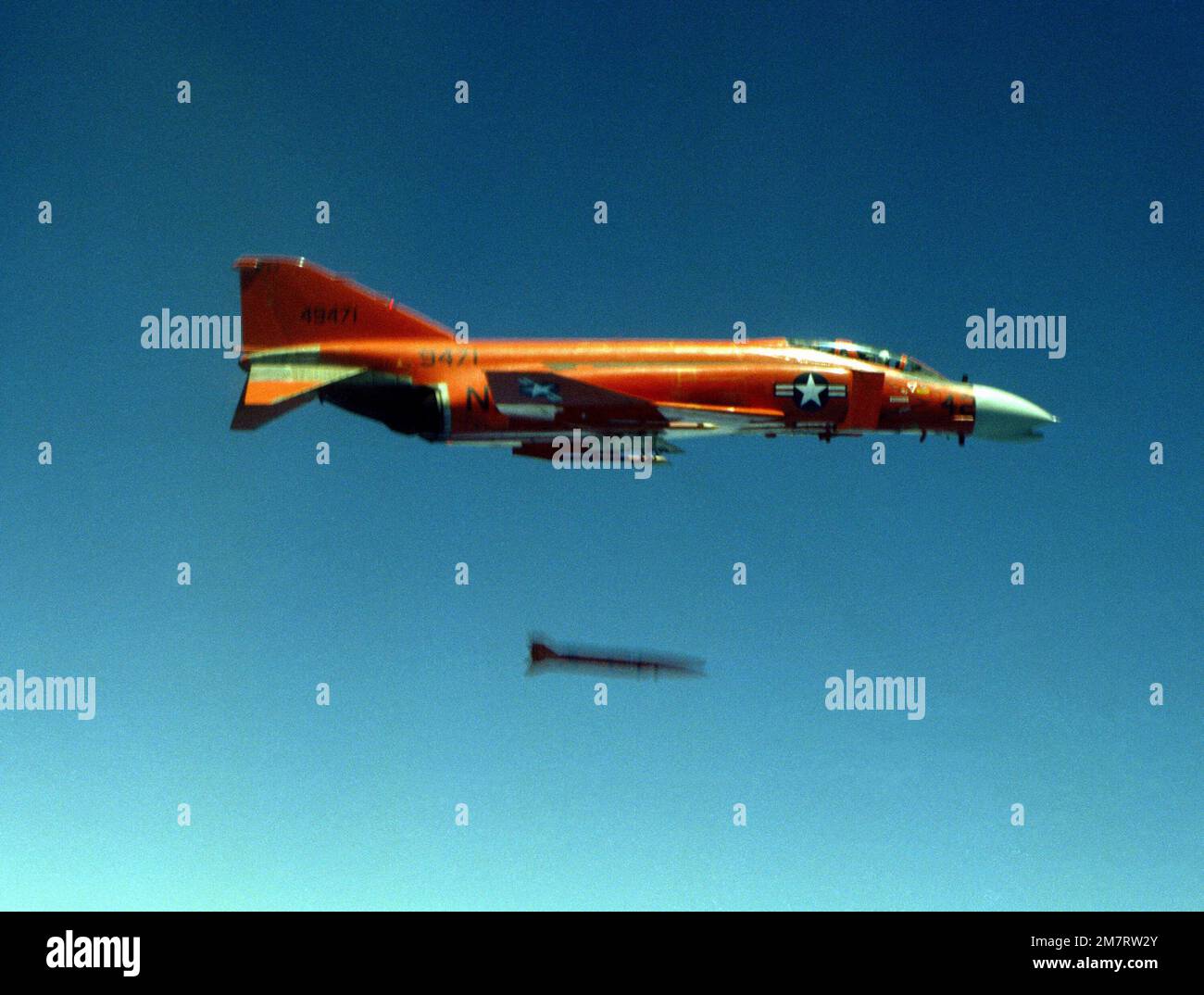 Right side view of a QF-4B Phantom II target aircraft launching an AQM ...