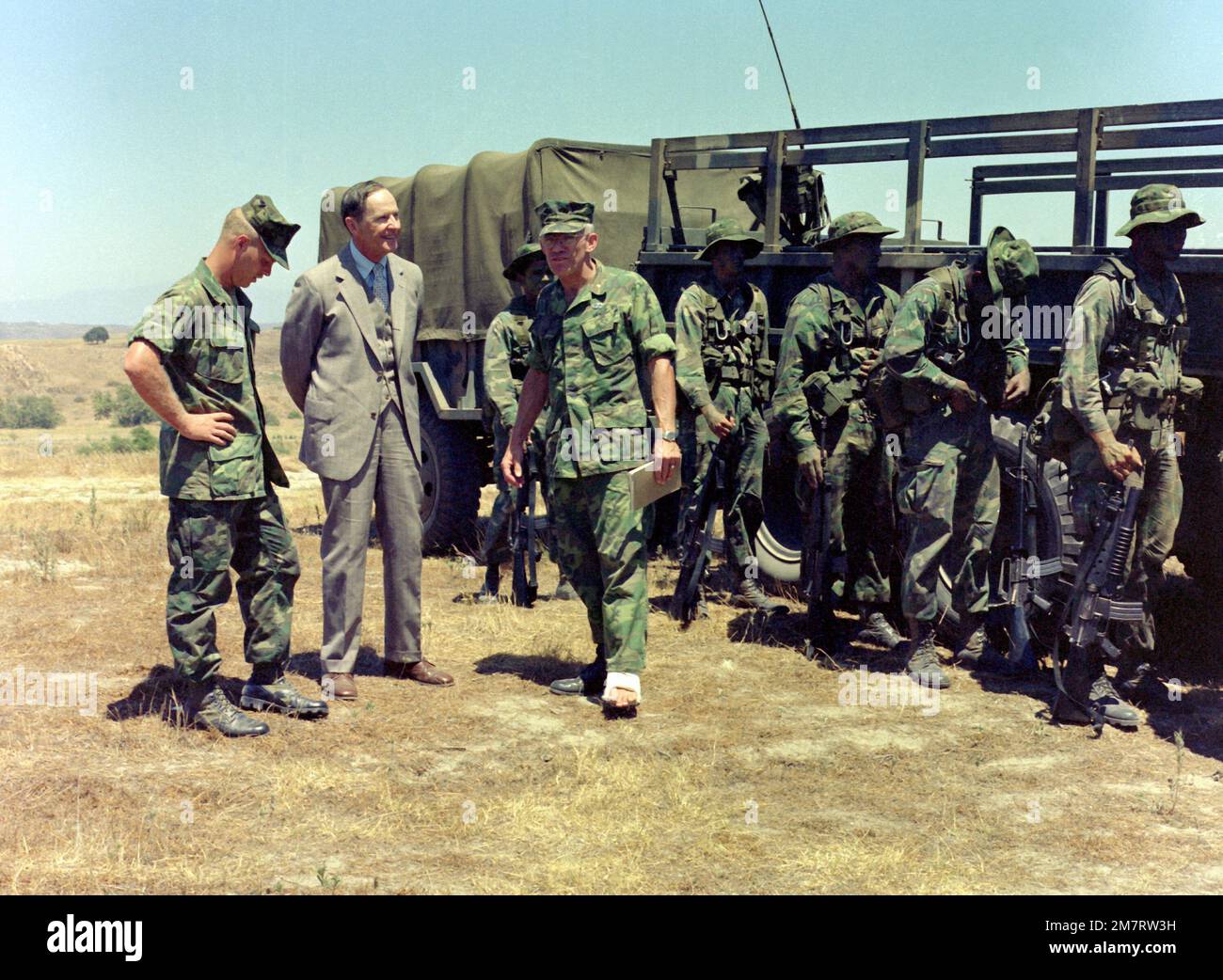 Assistant Secretary of the Navy (Comptroller) D. J. Conn talks with ...