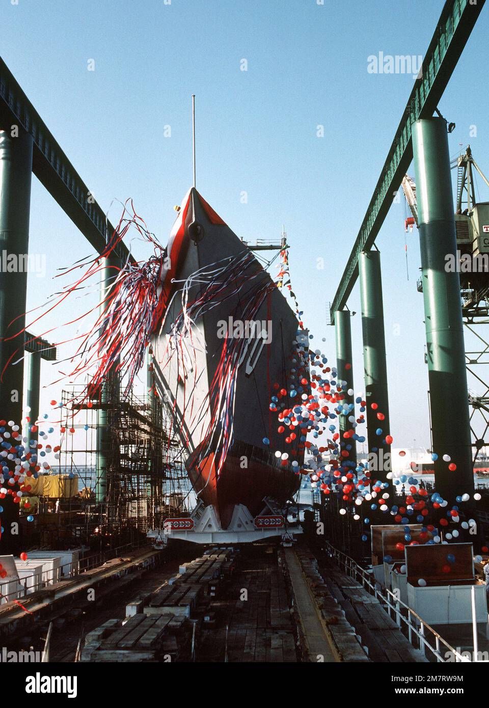Balloons float skyward as the guided missile frigate USS REID (FFG-30 ...