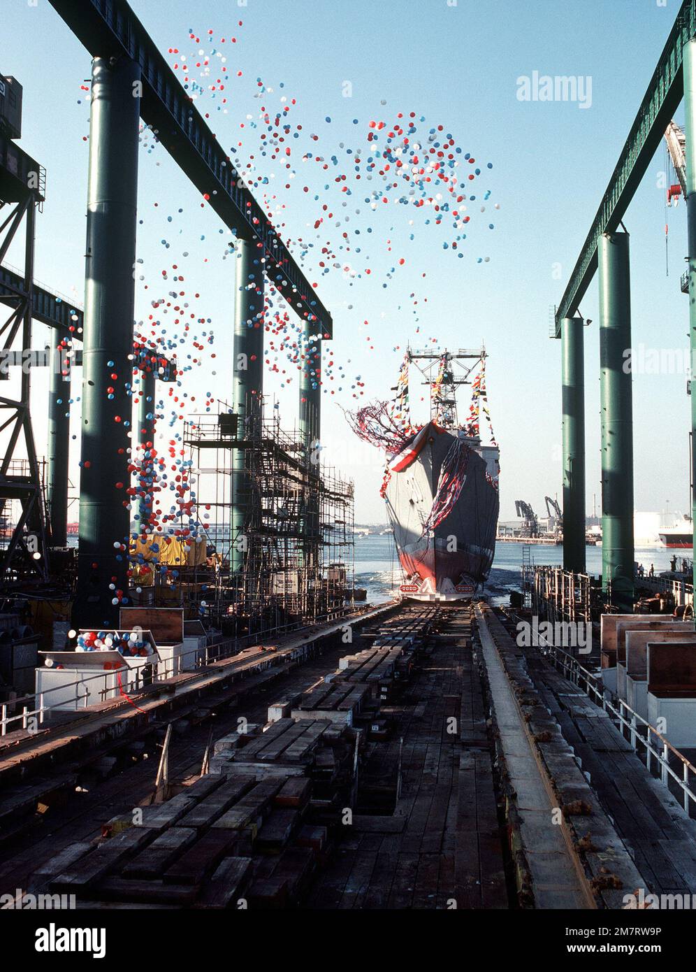 Balloons float skyward as the guided missile frigate USS REID (FFG-30 ...