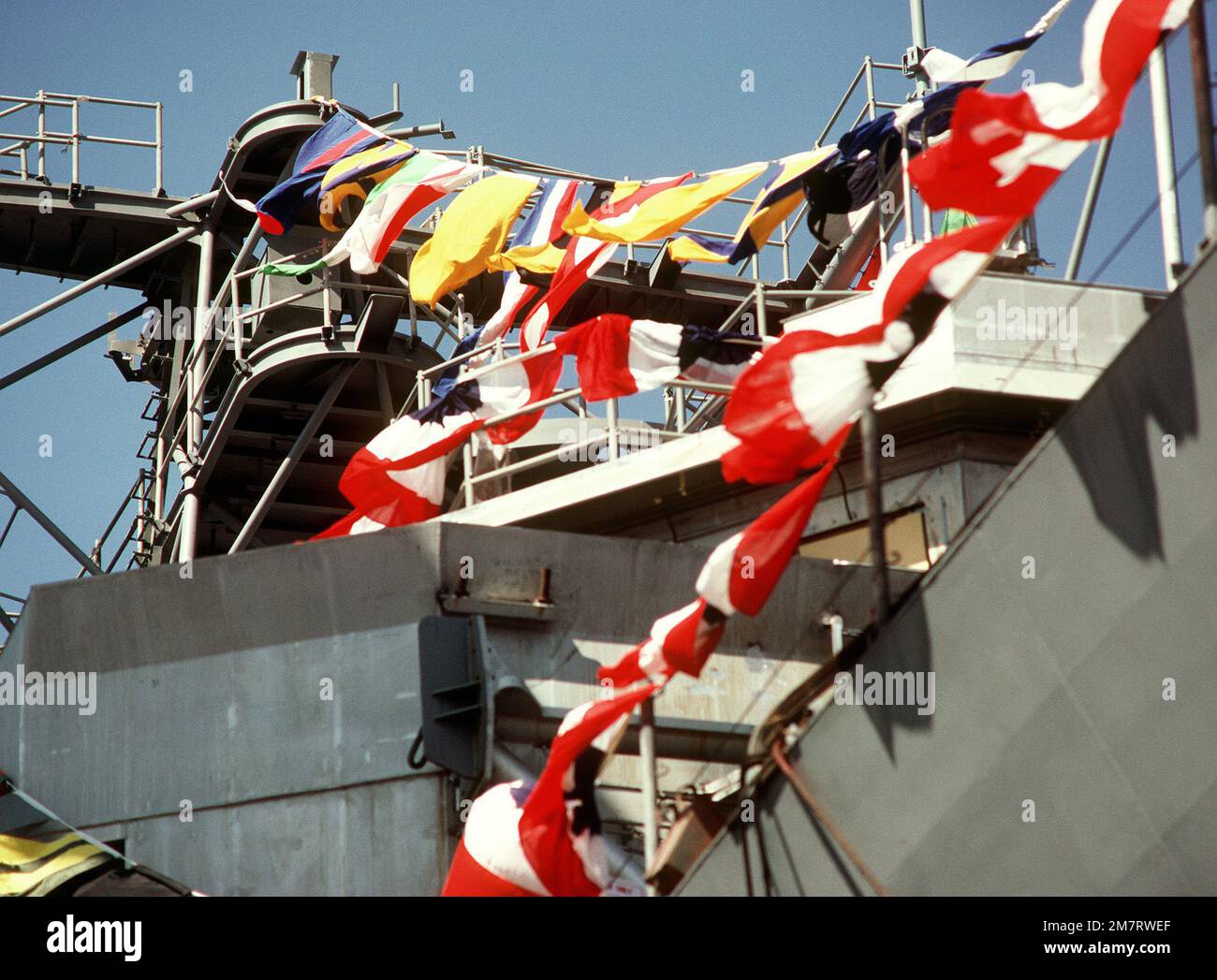 A view of the dress of flags aboard the guided missile frigate USS REID ...