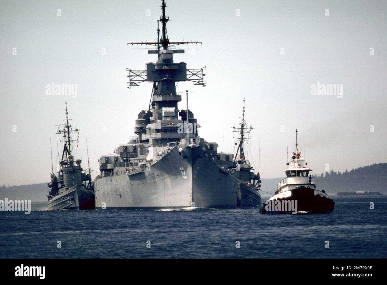 The Shelly Foss and two fleet tugs, USS MOCTOBI (AFT-105), left, and ...