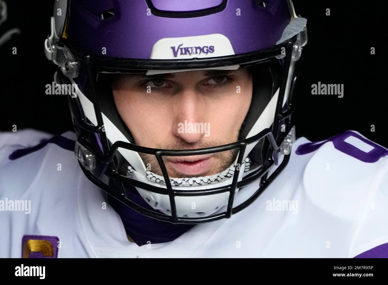 Minnesota Vikings quarterback Kirk Cousins heads out on to the field ...