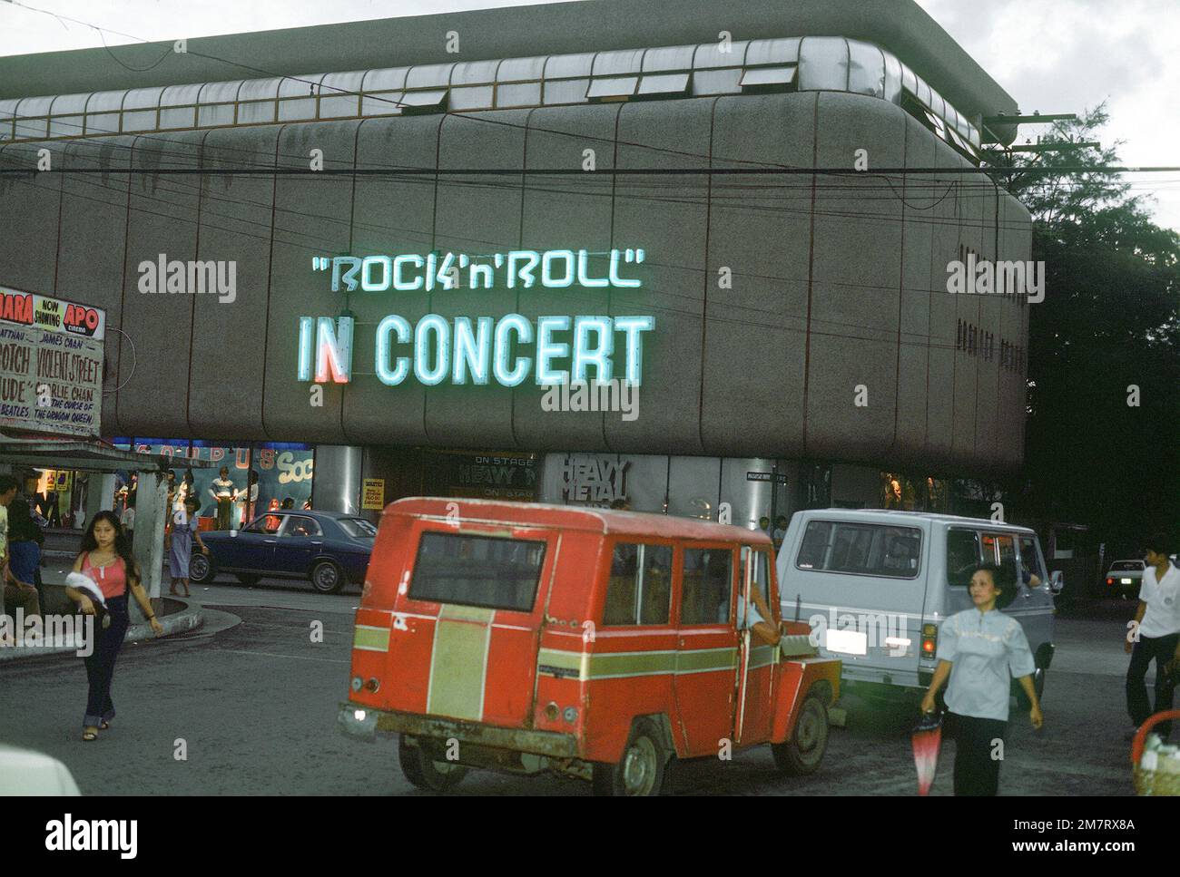 An exterior view of a rock and roll concert hall. Base: Olongapo State ...