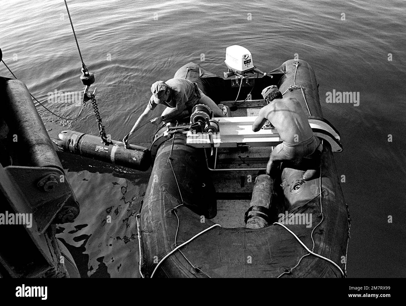 Two members from Explosive Ordnance Disposal Team Two, Detachment 40 ...