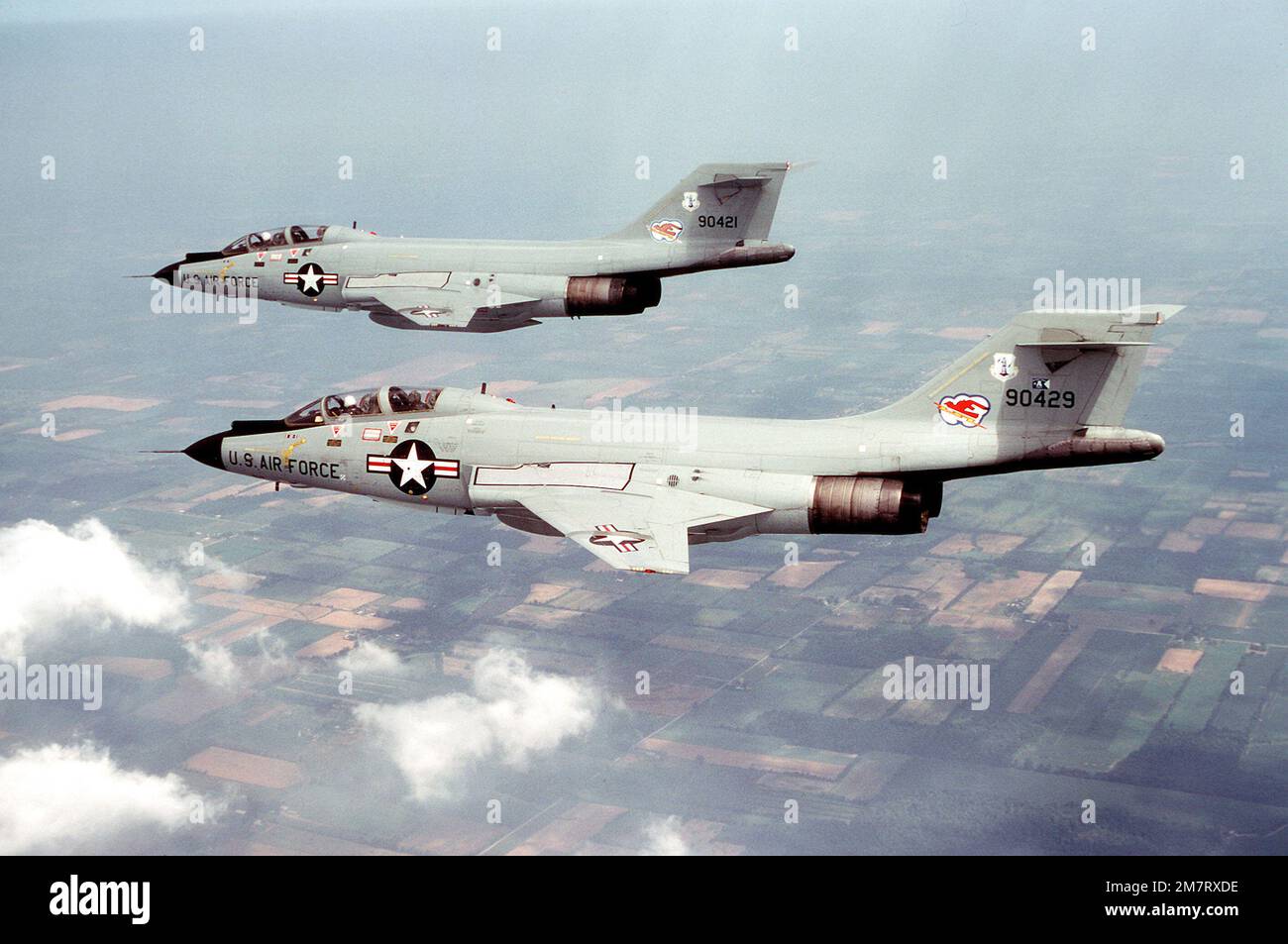 AN air-to-air left side view of two F-101 Voodoo aircraft near Niagara ...
