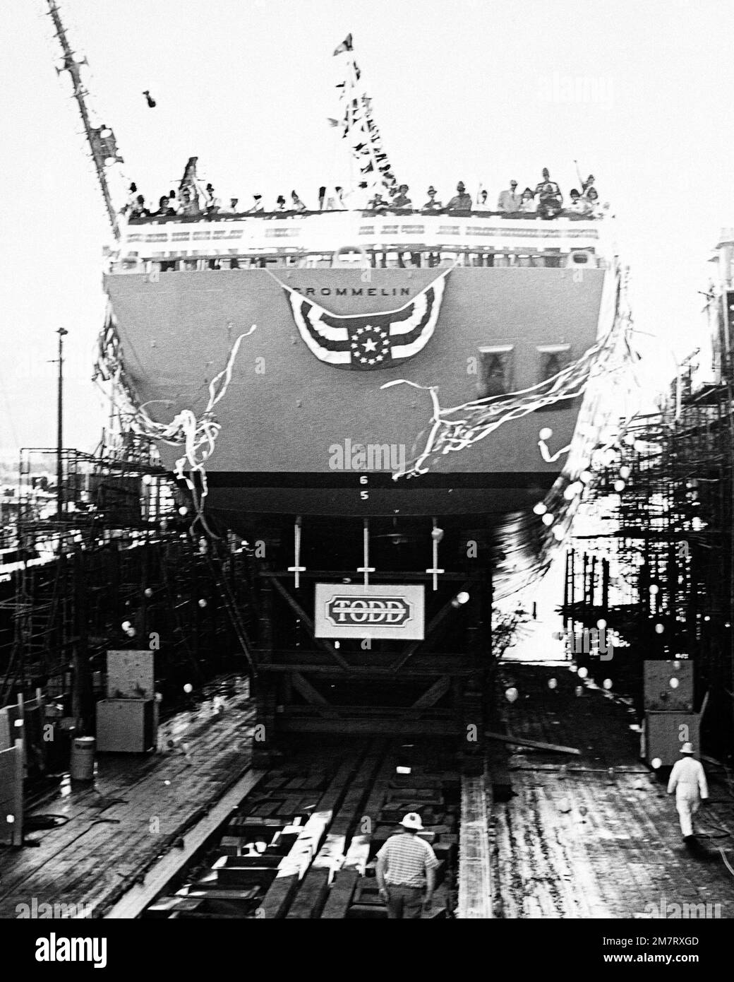 A stern view of the guided missile frigate CROMMELIN (FFG 37) sliding ...