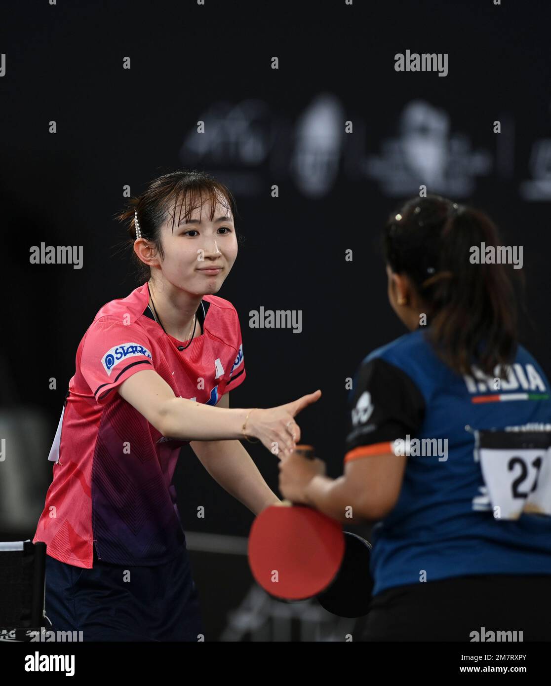 Doha, Qatar. 10th Jan, 2023. Hayata Hina (L) of Japan shakes hands with ...
