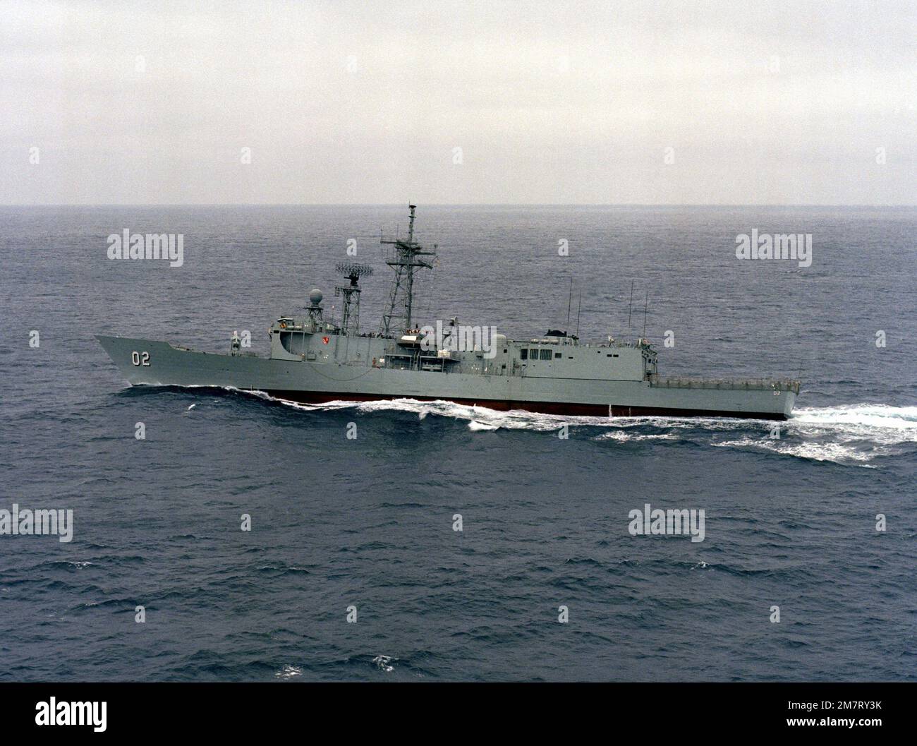 Aerial port beam view of the Australian Frigate HMAS CANBERRA (F-02 ...