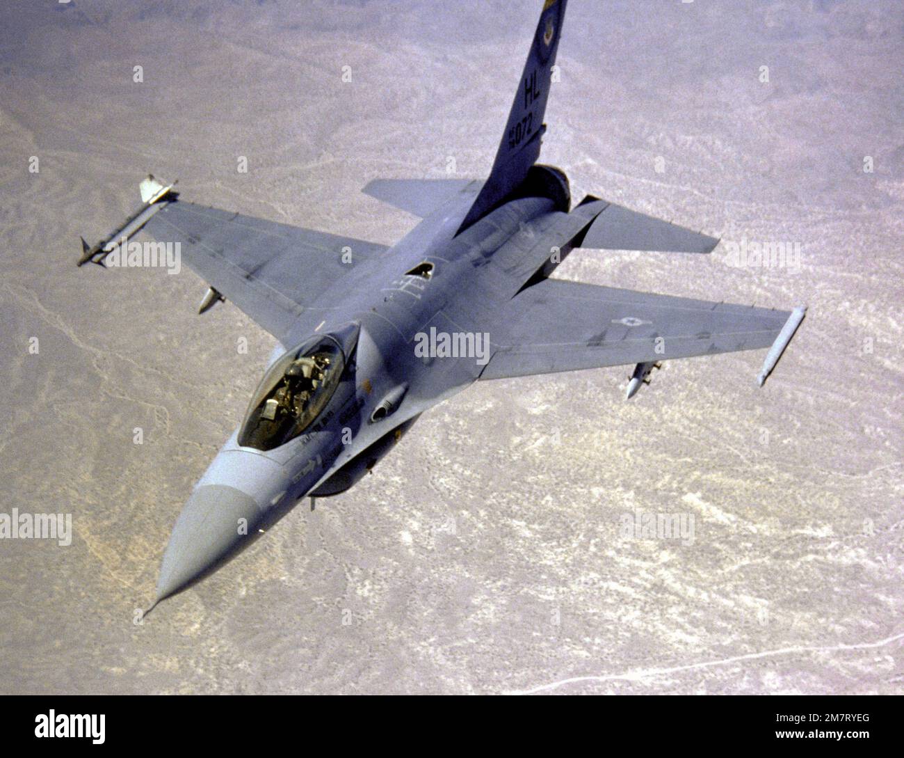 An air-to-air top left view of a 388th Tactical Fighter Wing F-16A ...