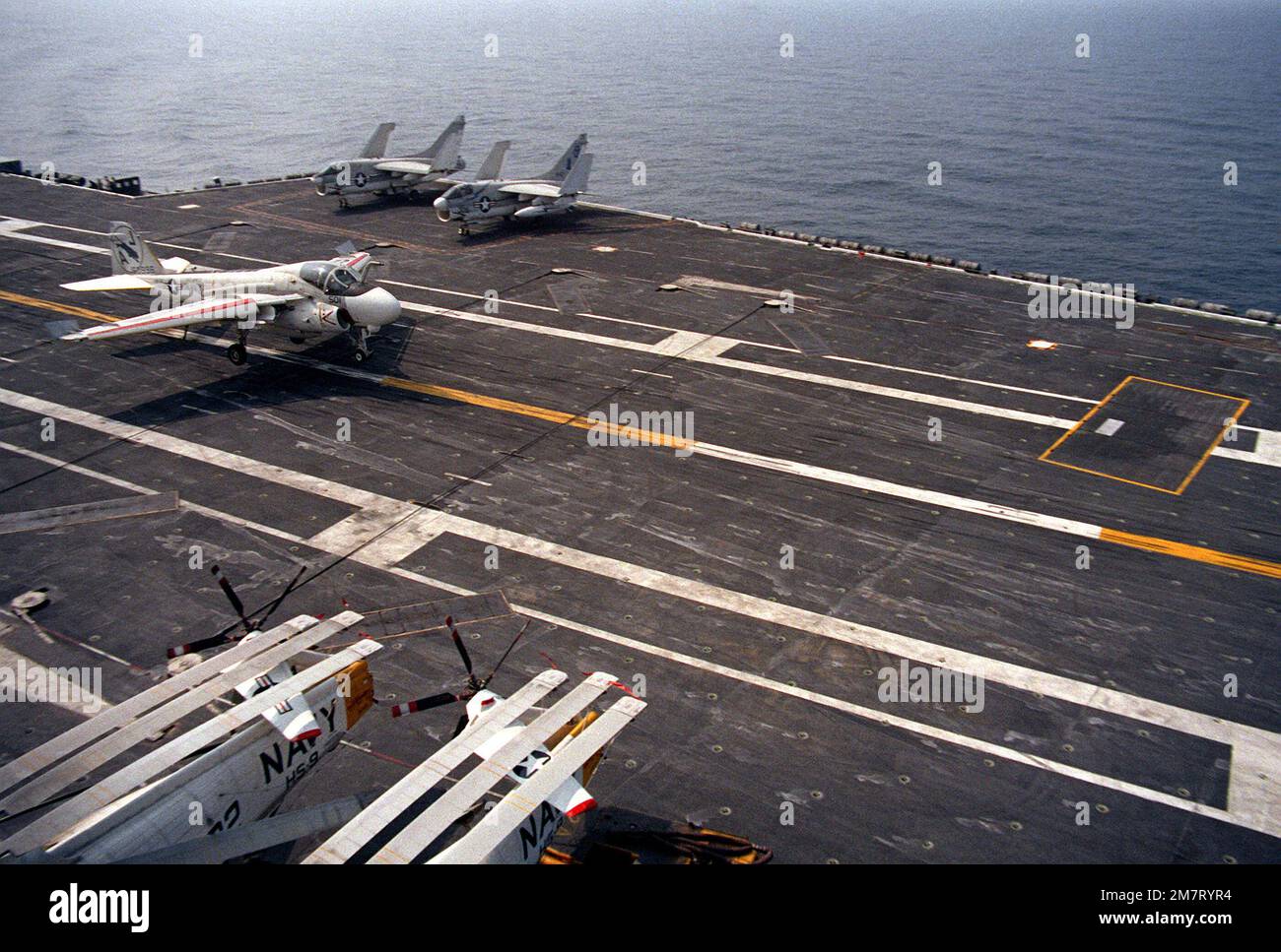 An A-6 Intruder aircraft comes for recovery aboard the nuclear-powered aircraft carrier USS ...