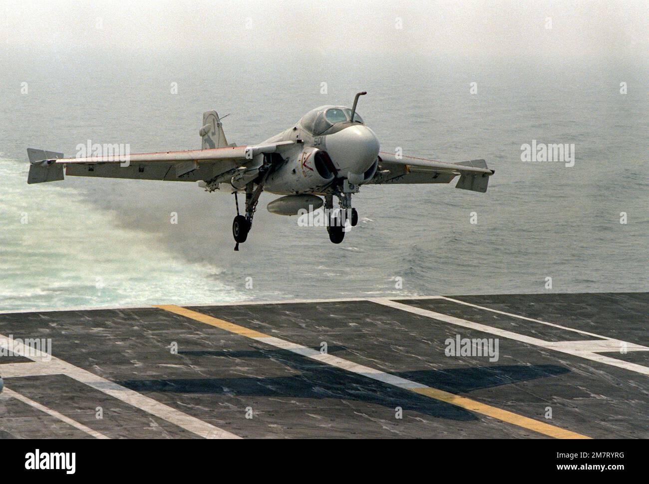 A front view of an A-6E Intruder aircraft coming in for a landing ...