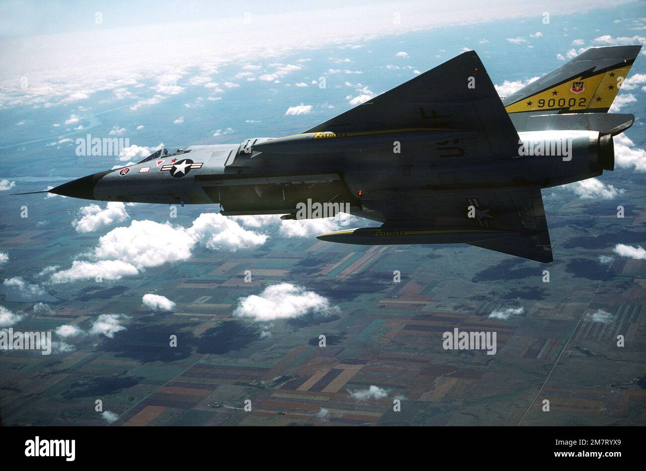 AN air-to-air left side view of an F-106 Delta Dart aircraft with its ...