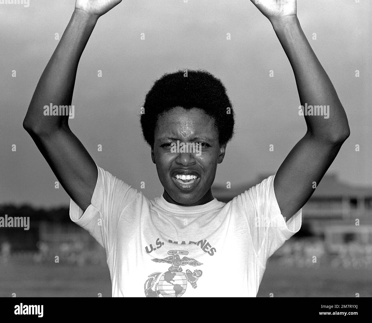 PVT Melton of Series 10b, leads her platoon across the finish line as ...