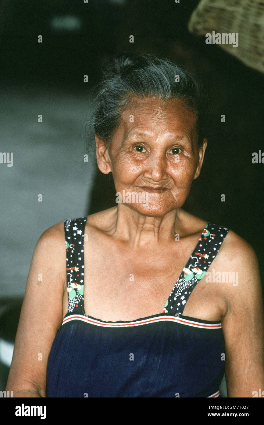 A close-up view of an elderly Filipino woman. Base: Olongapo State ...