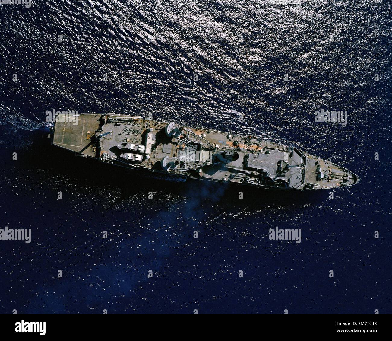 An overhead view of the submarine tender USS HUNLEY (AS 31) underway ...