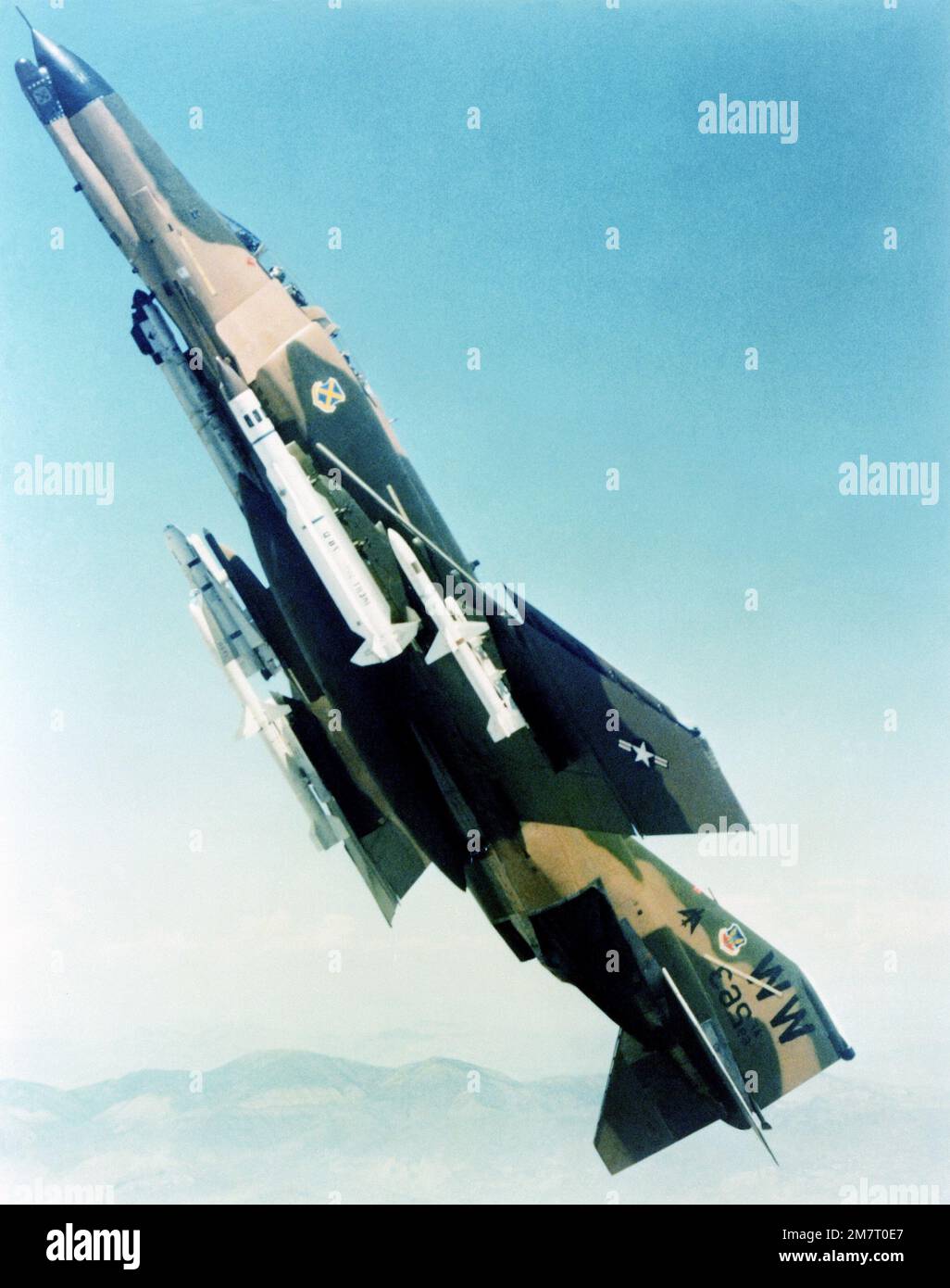 An air-to-air right side view of an Air Force F-4G Wild Weasel aircraft ...