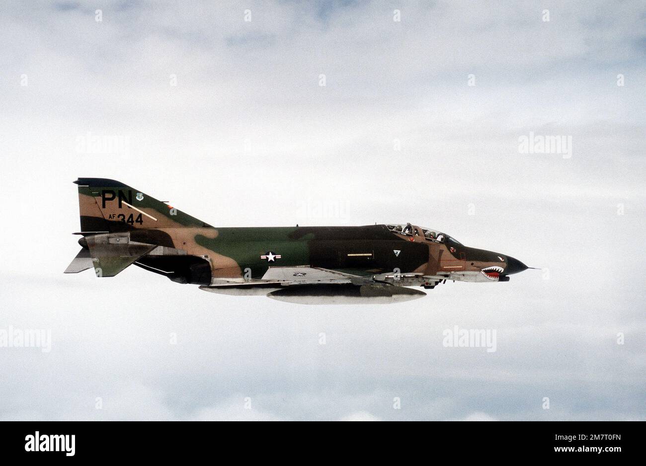 AN air-to-air right side view of an F-4 Phantom II aircraft from the ...