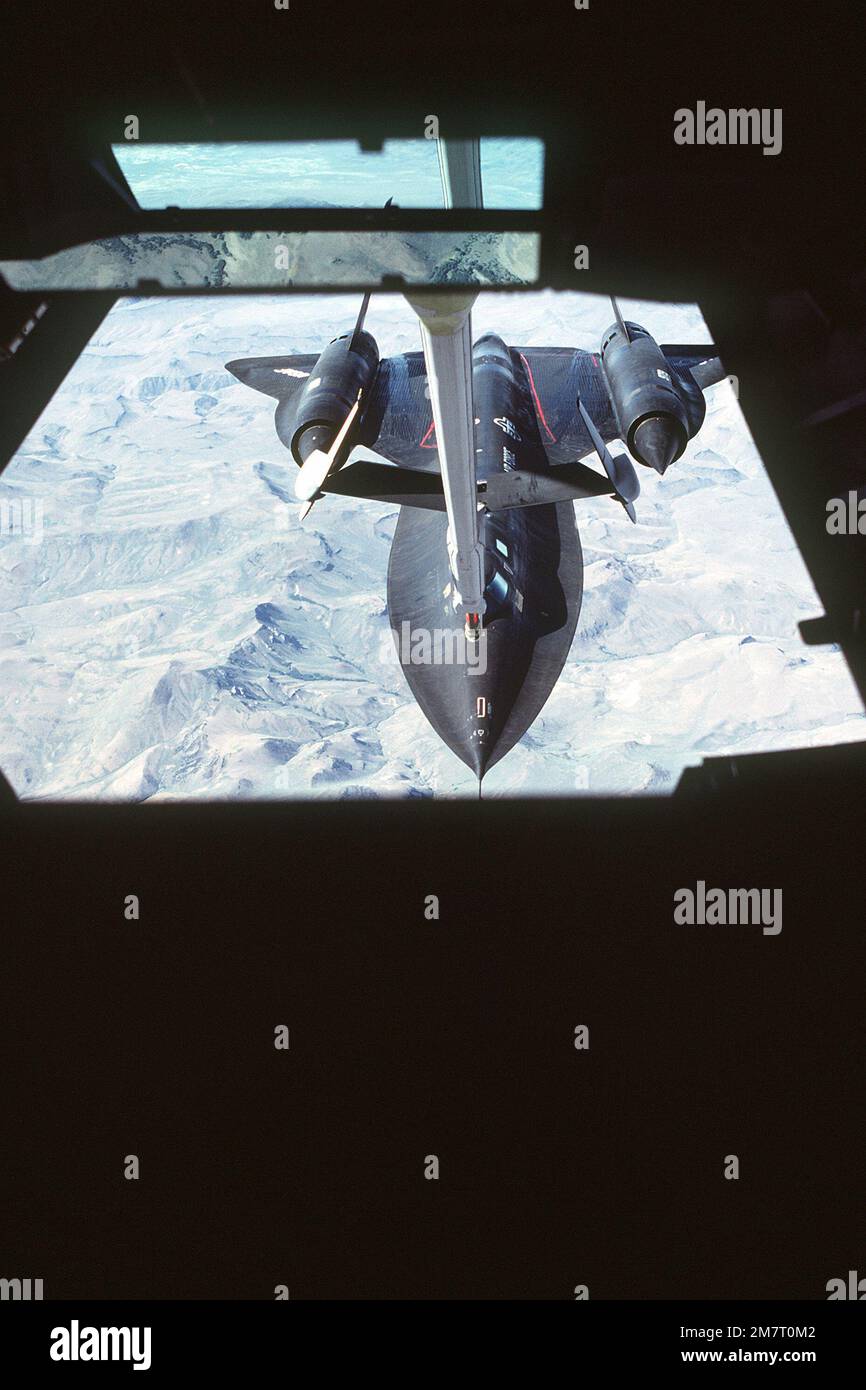 Front view of an SR-71 Blackbird aircraft in-flight during testing. The ...