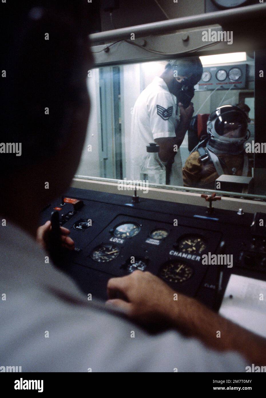 SGT Horton assists an SR-71 Blackbird aircraft pilot in an altitude ...