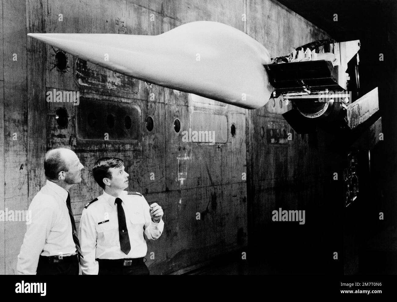 CPT Walter West, an Air Force test director, right, and John Riddell ...