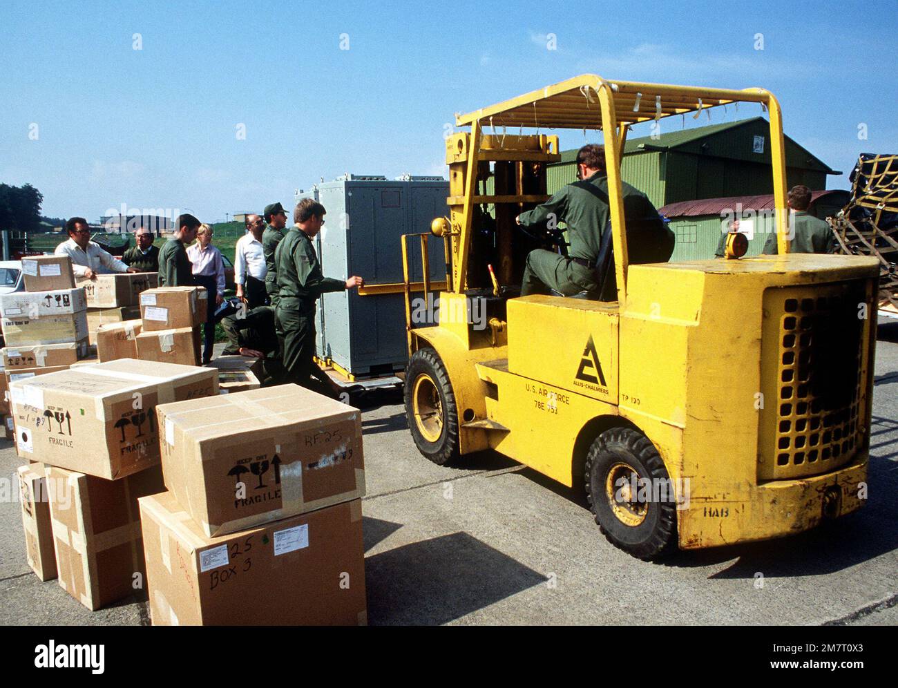 A medium-sized forklift is used by members of the 50th Component Repair ...