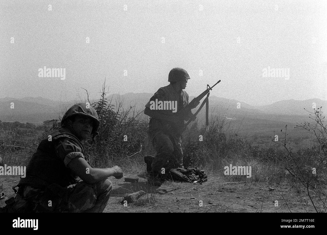 CPL Julio Melendez (half kneeling) and LCPL Kurtis St. Dennis of the ...