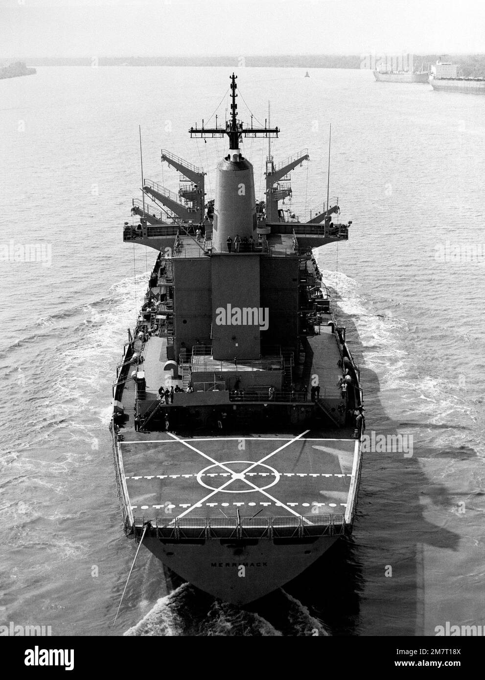 Aerial stern view of the oiler USS MERRIMACK (AO 179) underway. Country ...