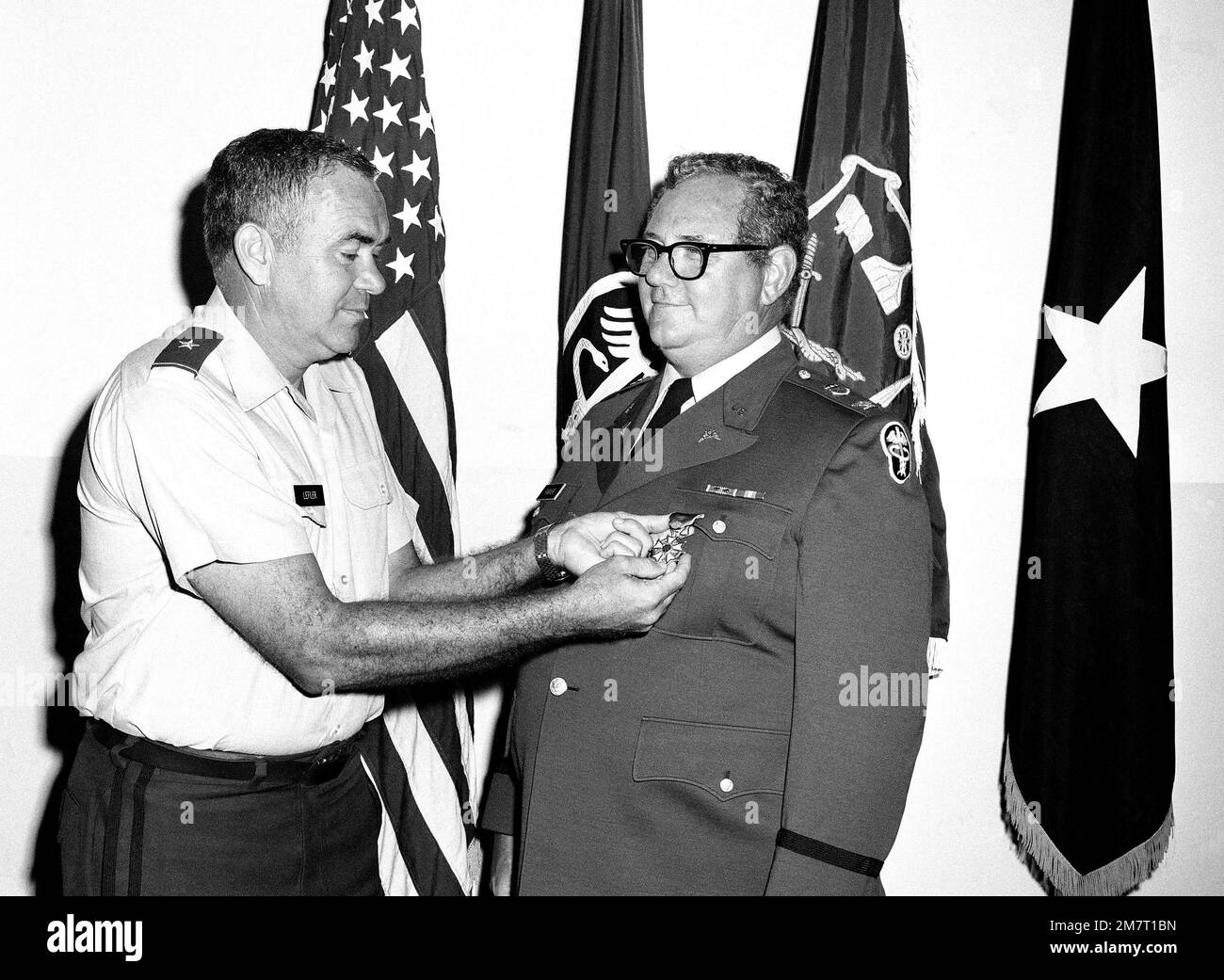 The Legion of Merit is presented to COL Warren A. Parker upon his ...