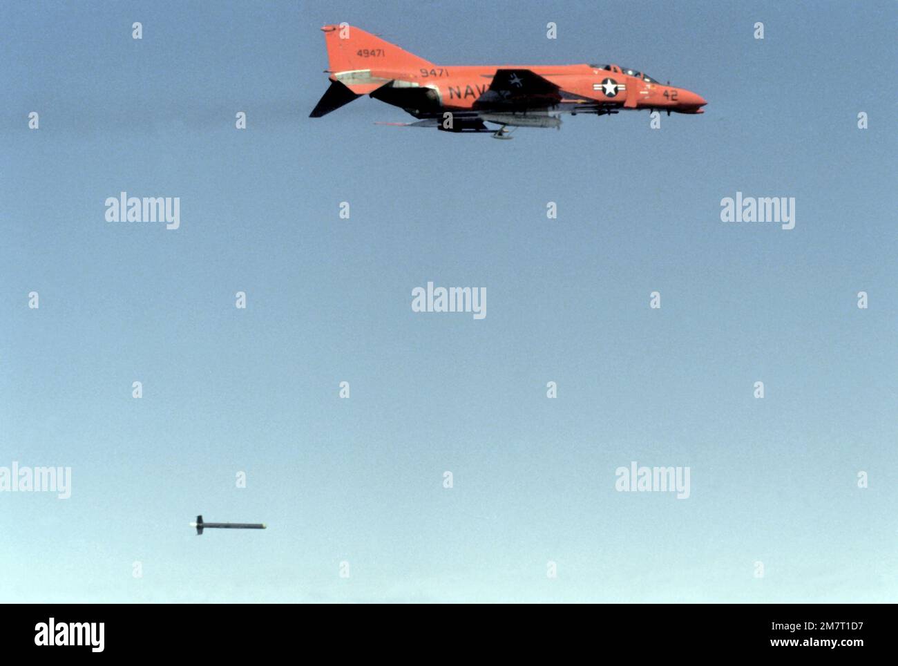 An air-to-air right side view of a QF-4B Phantom II aircraft towing a ...
