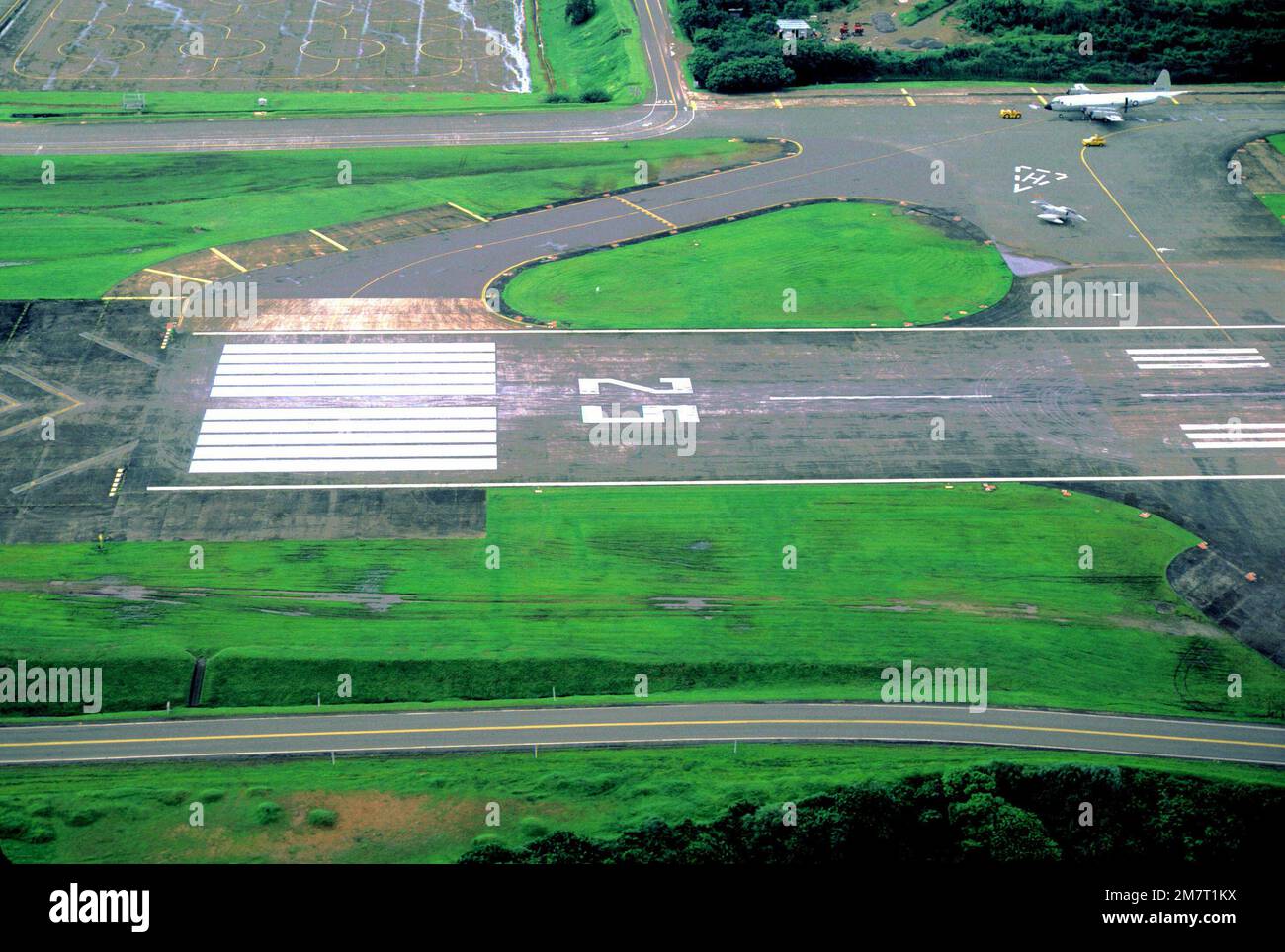 An aerial view of Runway 25. Base: Naval Air Station, Cubi Point State ...