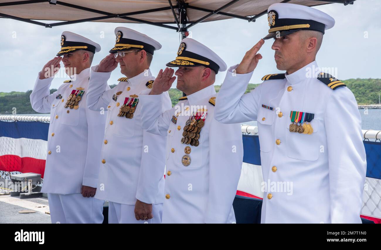 GUAM (May 12, 2022) -- From left, Capt. Steven Wasson; Capt. John Bub ...